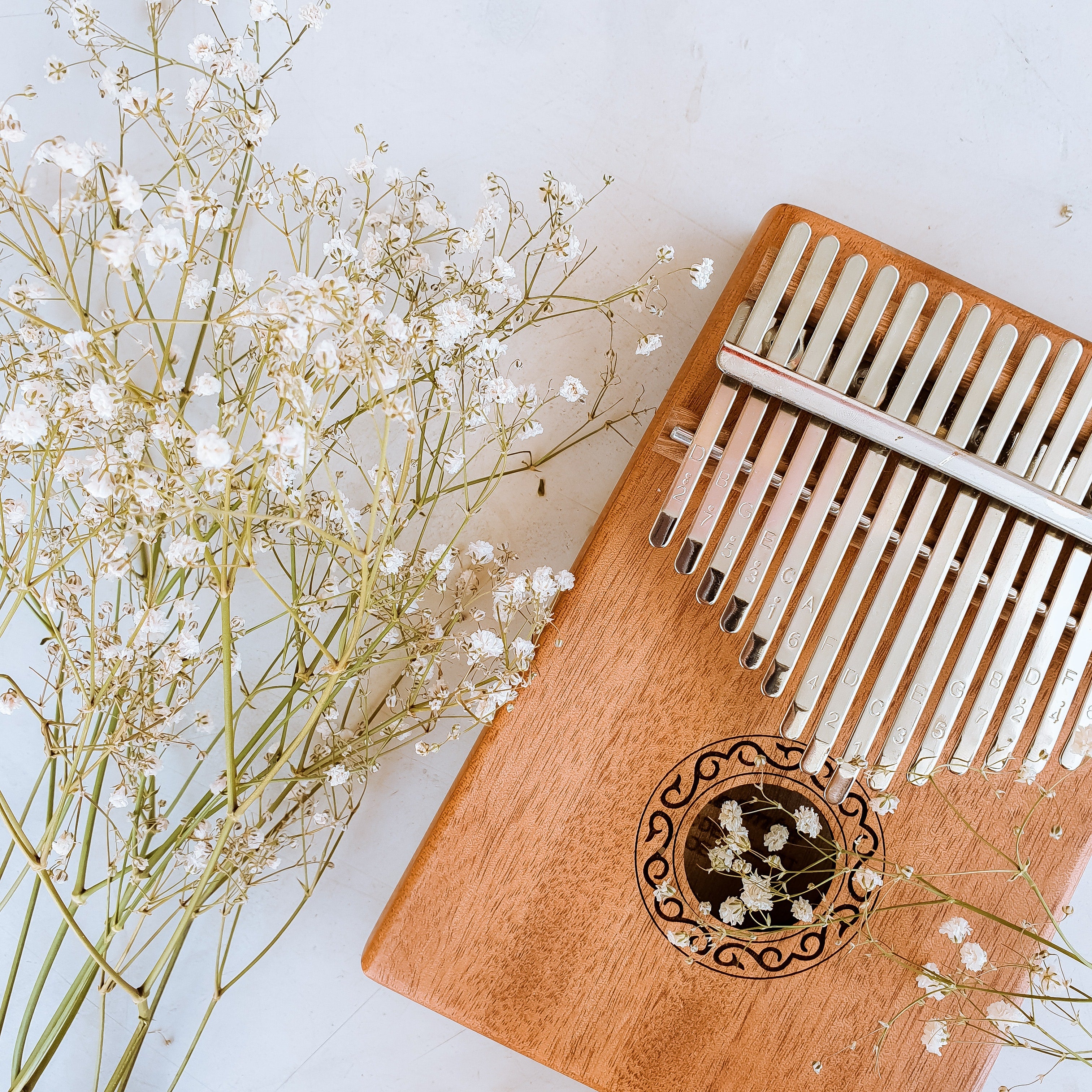 How To Play Kalimba: A Guide to Tuning, Techniques, and Scale Practice